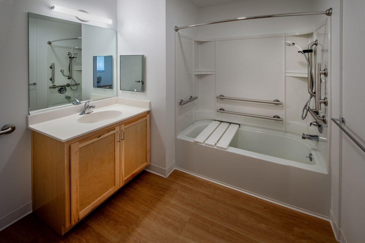 Tub Transfer Bench Explained: Caregiver FAQs | Trualta